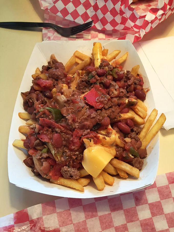 Chili fries that don't know the meaning of restraint. Beans, beef, and cheese creating a fork-required masterpiece that's worth the mess.