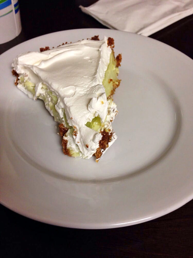 Key lime pie with a cloud of whipped cream—the perfect sweet-tart finale that makes you contemplate ordering a second slice.