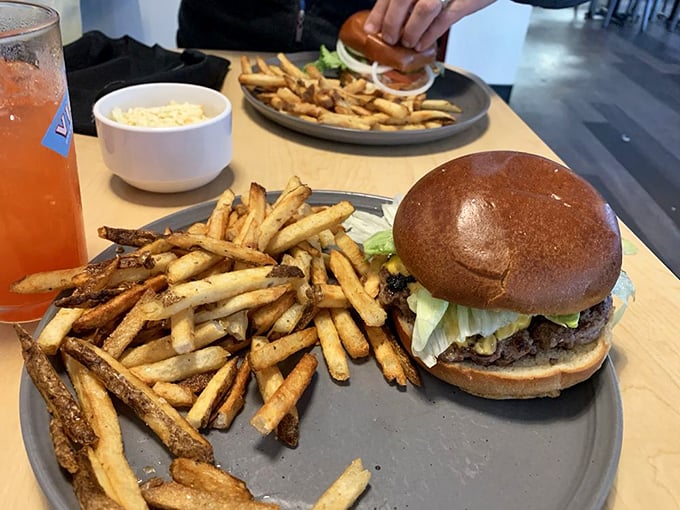 Simplicity perfected: the 55 Burger with cheese on a perfectly toasted bun. Sometimes the classics need no improvement.