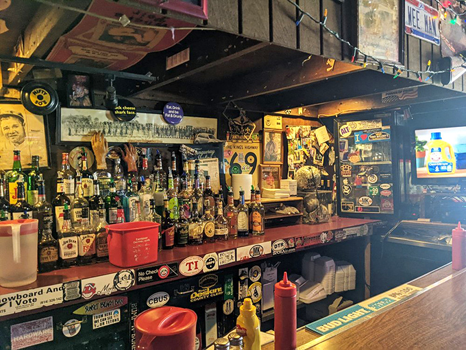 Behind the bar lies liquid courage for those about to face down Columbus's most formidable food challenge.