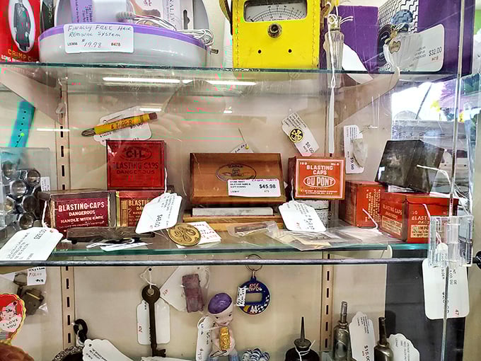 This booth is what happens when someone with exquisite taste decides "more is more." From vintage bottles to classic advertising, it's a masterclass in controlled chaos.