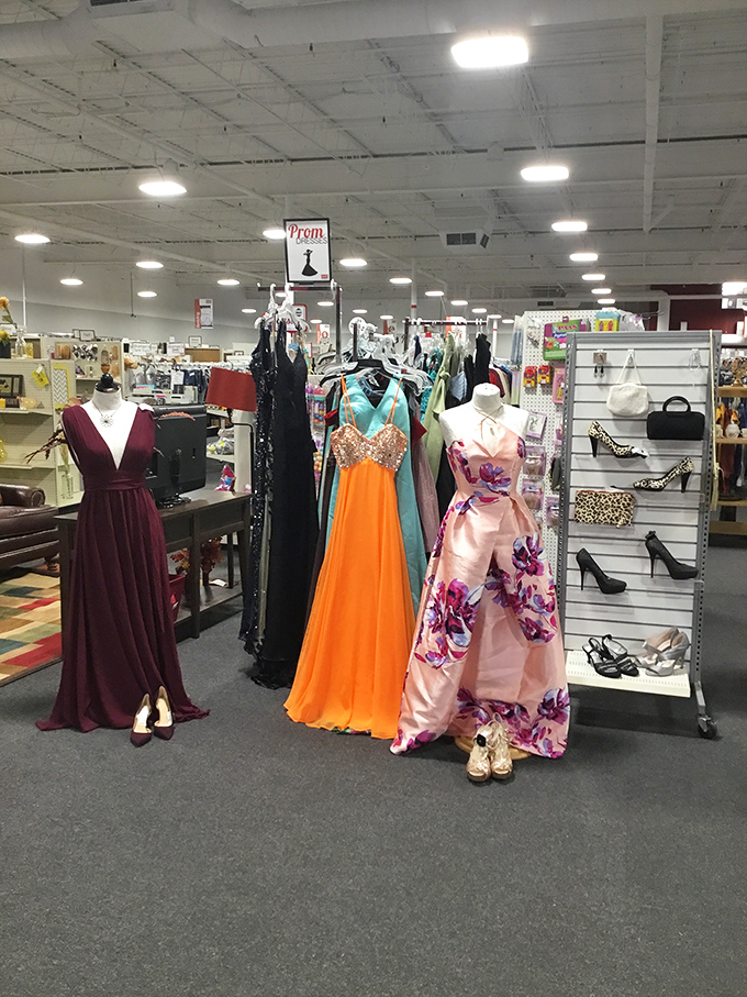 Prom dresses waiting for their Cinderella moment. That orange gown could turn any wallflower into the belle of the ball.
