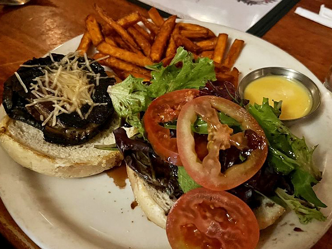 This isn't just a burger &ndash; it's a towering achievement of beef, tomato, and greens that requires jaw exercises before attempting.