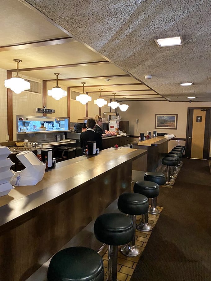 The counter where regulars have been holding court for decades. More stories have been told here than in a library.