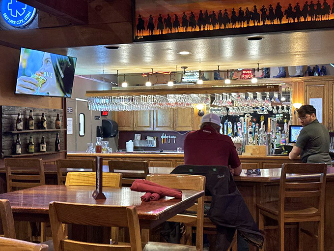 The bar area strikes that perfect balance&mdash;enough TVs to catch the game, enough warmth to make you forget you're not in someone's really nice den.