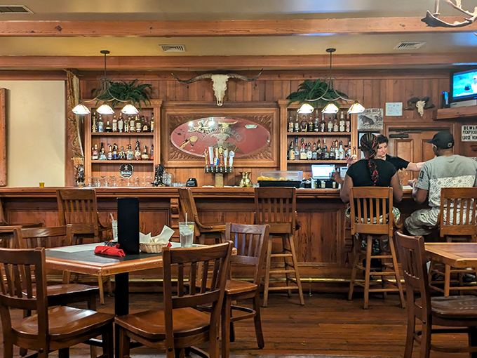 Not just a bar but a watering hole where locals gather. Those bottles aren't just spirits&mdash;they're conversation starters waiting to happen.