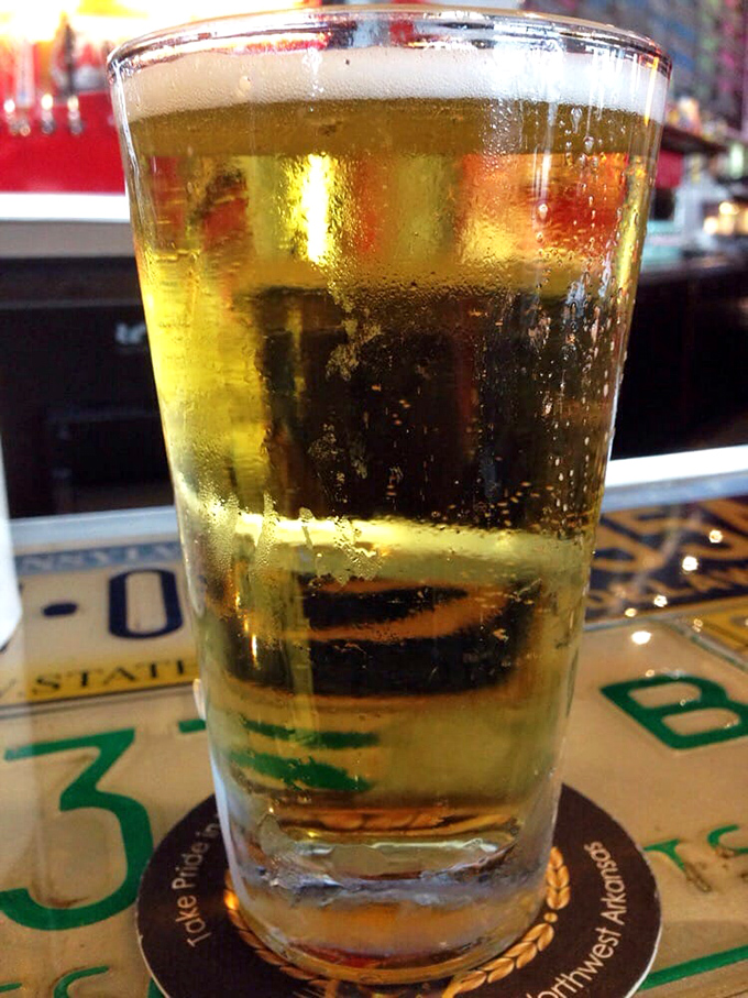 Condensation races down the glass like excited tears. This beer knows it's about to meet its perfect burger match.