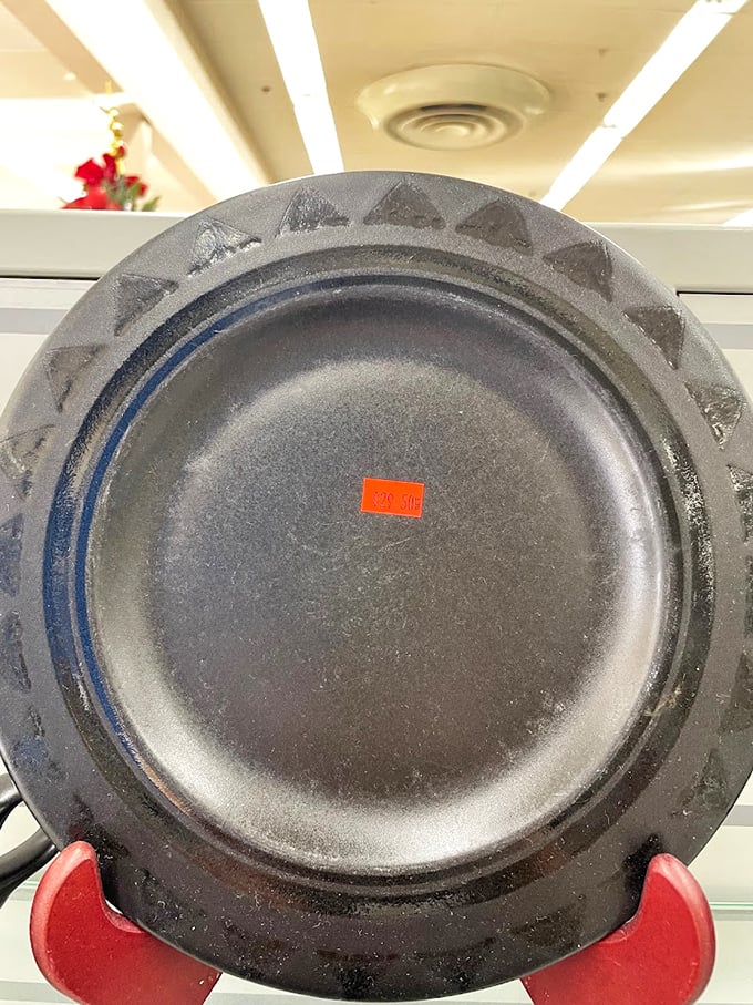 This cast iron plate isn't just cookware&mdash;it's culinary heritage with decades of seasoning. Someone's grandmother made perfect cornbread in this beauty.