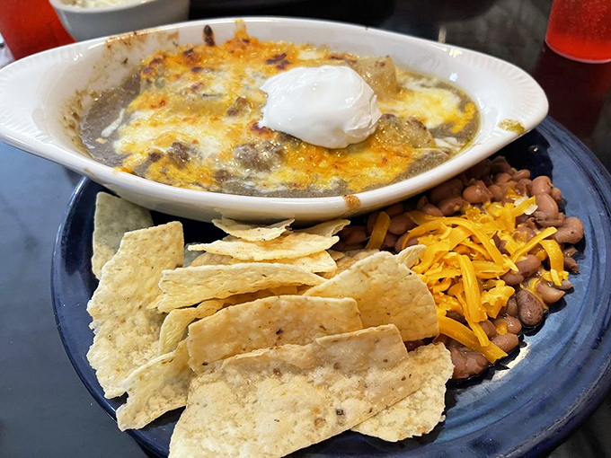 This Mexican-inspired blue plate special comes with a dollop of sour cream that melts into the dish like a snowflake landing on warm pavement.