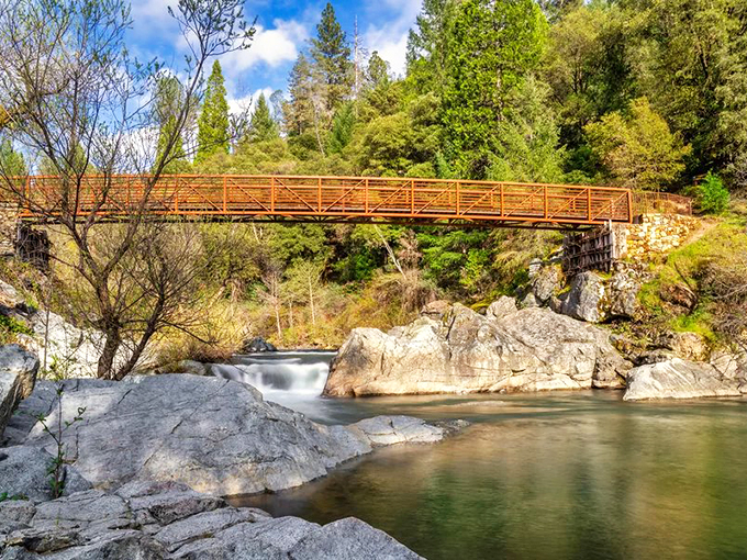 This wooden bridge spans more than just water&mdash;it connects visitors to trails where Gold Country's natural splendor rivals its historical riches.