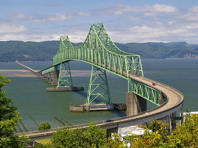 Bridge: The Astoria-Megler Bridge arches gracefully across the Columbia like a green giant, connecting Oregon to Washington in spectacular engineering style.