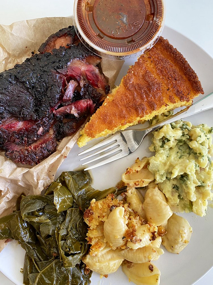 A plate that tells the story of American culinary traditions&mdash;smoke-infused brisket, vibrant greens, and cornbread that channels generations of know-how. 