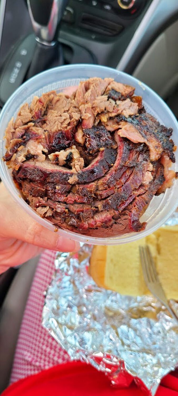 A container of brisket that turns your car console into the finest dining establishment in three counties.