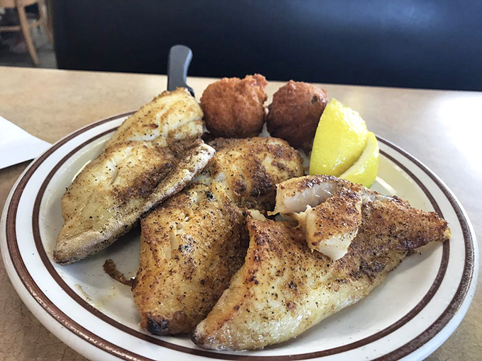 Perfectly seasoned broiled fish that proves sometimes the simplest preparation lets quality ingredients shine brightest – a lesson in seafood restraint.