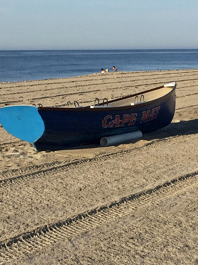 A lonely lifeguard boat waits for summer crowds &ndash; like a sentinel of sand with the best office view in New Jersey.