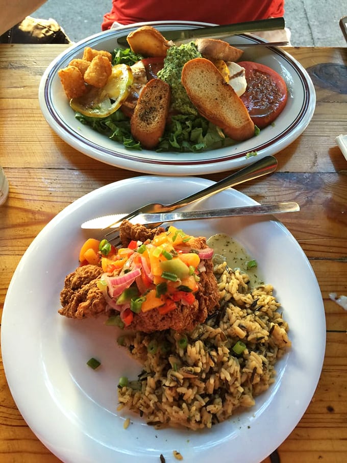 Two plates that tell different stories: one of fresh, vibrant ingredients, the other of comfort food elevated to art form status.