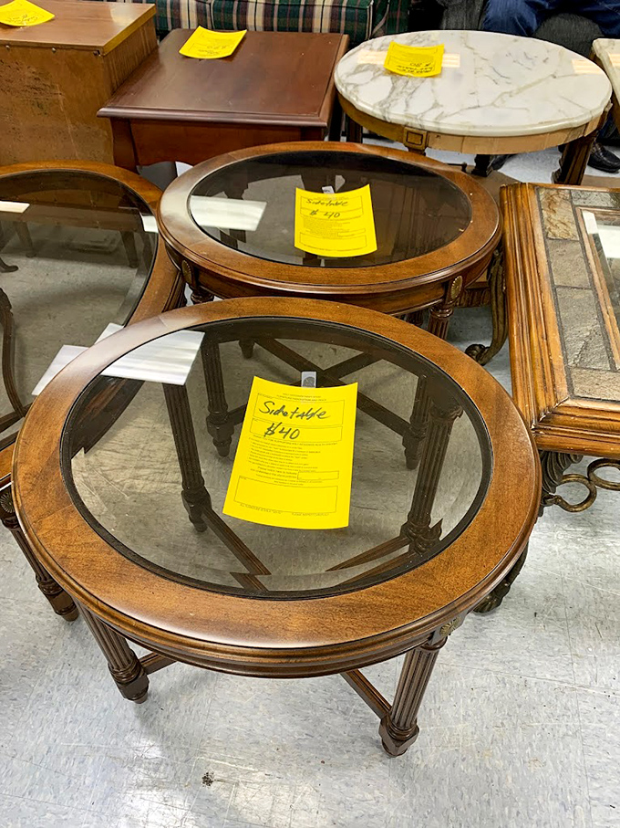 Glass-topped coffee tables with price tags that won't require a second mortgage, arranged in a silent competition for your living room's affection.