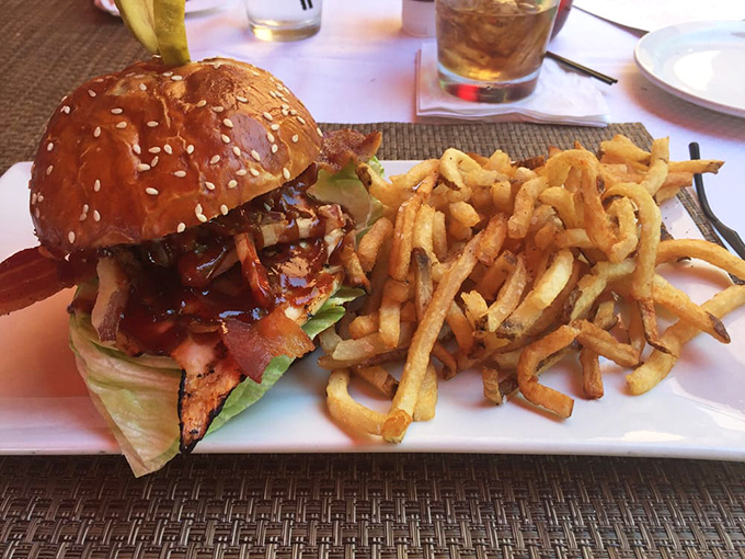 This isn't just another burger &ndash; it's architectural brilliance on a brioche bun, with fries so perfectly golden they deserve their own spotlight.