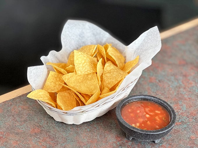 These aren't just chips and salsa—they're the opening act to a memorable meal and the perfect vehicle for pre-enchilada anticipation.