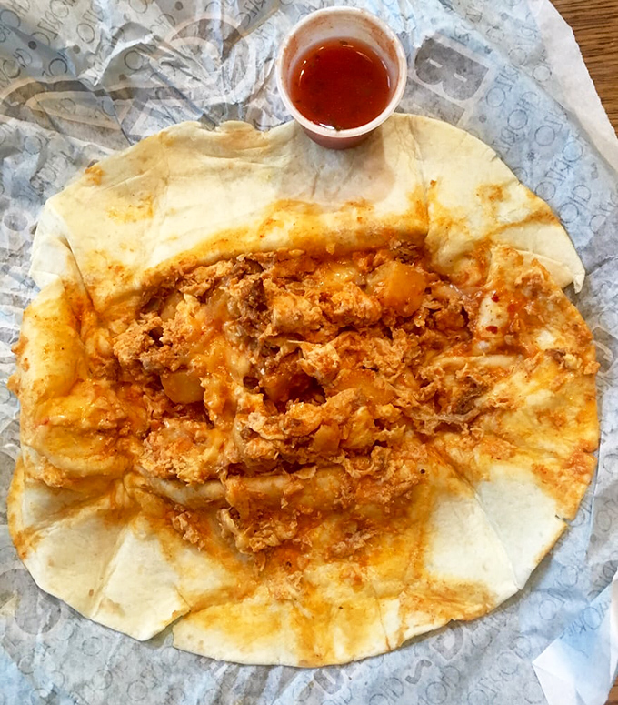 Breakfast in its most honest form&mdash;a flour tortilla embracing scrambled eggs and chorizo like they're long-lost friends finally reunited after years apart.