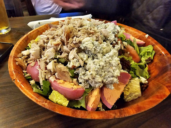 A wooden bowl of Cobb salad so fresh and abundant it could moonlight as a centerpiece. Garden delights with protein powerhouses.