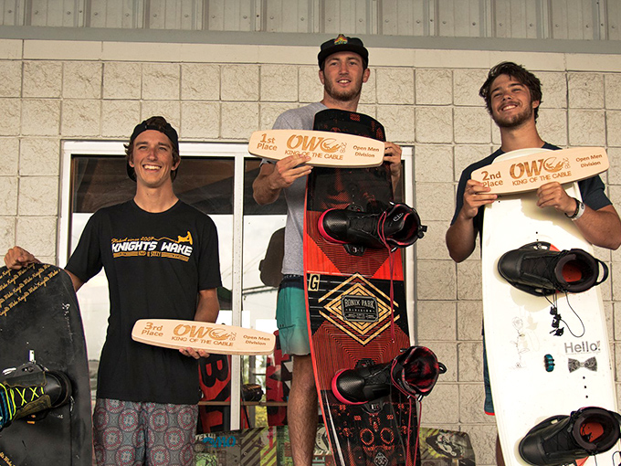 Victory tastes sweeter when holding a wooden trophy. These wakeboarding champions started somewhere—probably face-planting like the rest of us.