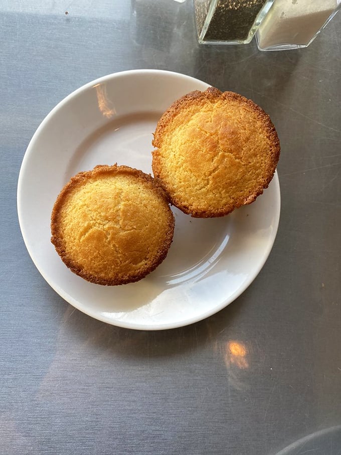 Golden cornbread muffins with crispy edges and tender centers&mdash;the supporting actors that steal the show on every plate.