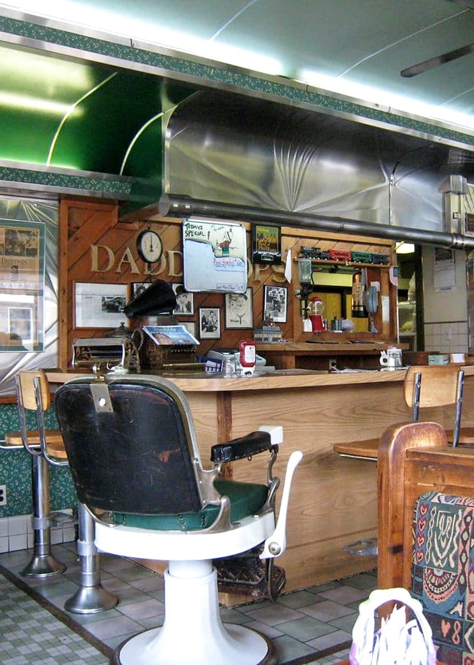 That barber chair isn't just decoration&mdash;it's a reminder that Daddypops is where community happens, haircuts or hamburgers, your choice.