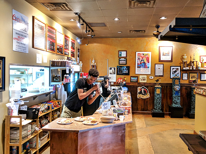 Behind the scenes where smoke meets meat&mdash;the staff prepares orders with the precision of barbecue artisans.