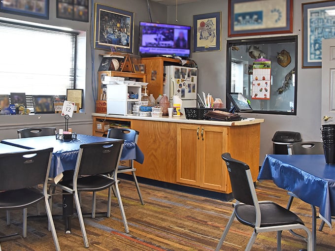 The counter area feels like walking into a friend's kitchen, where the TV might be on but everyone knows the real entertainment is what's coming from the smoker.