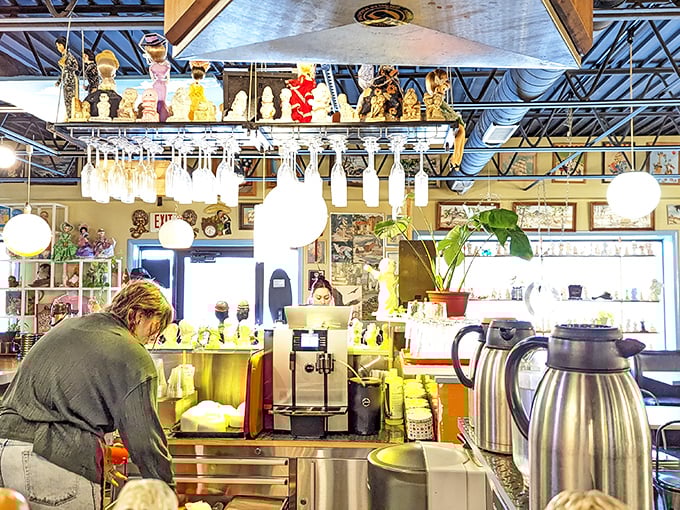 The counter area buzzes with morning energy, where coffee is poured with the reverence it deserves.