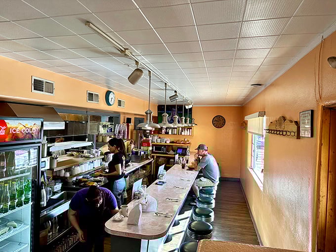 The counter where breakfast dreams come true, staffed by people who understand the sacred responsibility of morning sustenance.