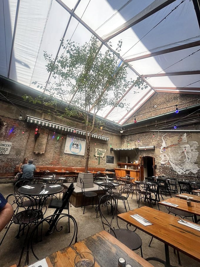 The courtyard feels like someone's secret garden that happens to serve excellent food&mdash;complete with a tree growing right through the roof.