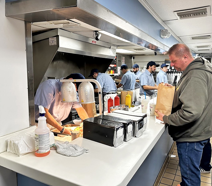 The customer's anticipation is palpable&mdash;that moment before the first bite when life's problems temporarily cease to exist.
