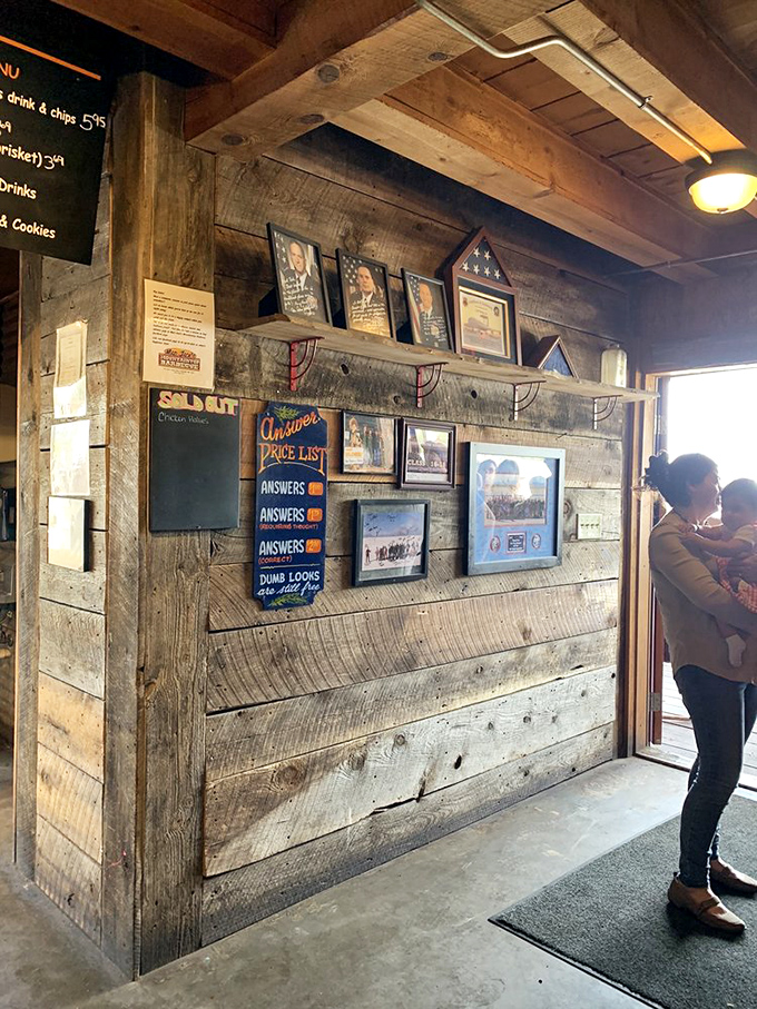 The wall decor tells you everything you need to know: this is a place with personality, humor, and absolutely no pretension.