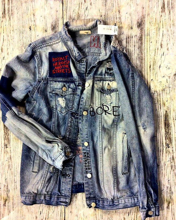 This distressed denim jacket tells stories its original owner never could. Pre-loved fashion with character that money alone can't buy.