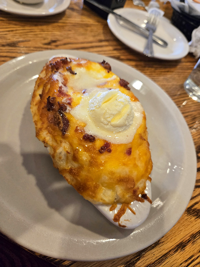 This isn't just a baked potato&mdash;it's a cheese-crowned, butter-melting masterpiece that makes you question why you'd ever eat anything else.