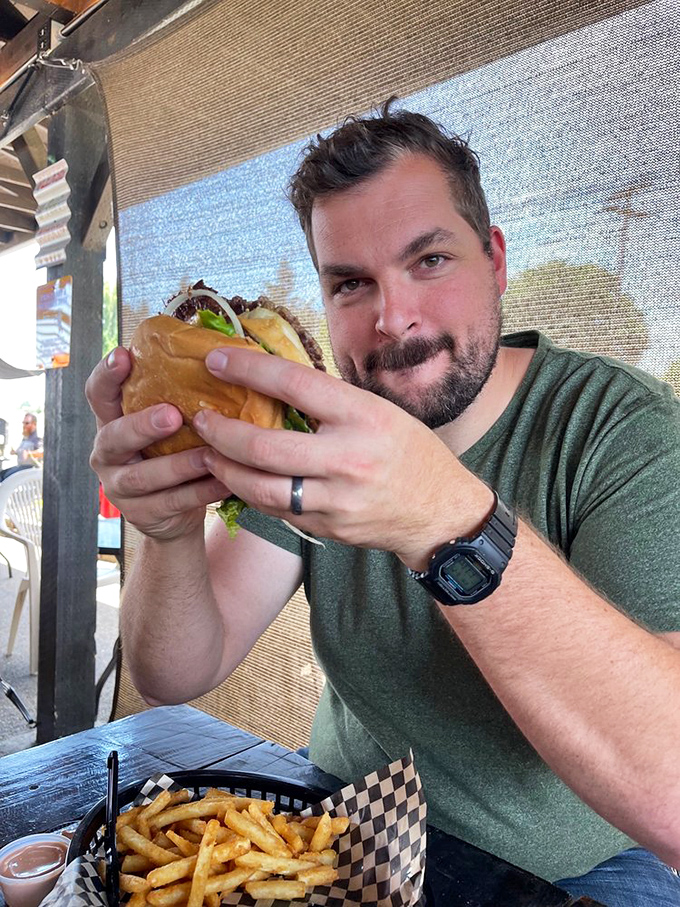 Vintage signs, corrugated metal, and the promise of exceptional burgers. This isn't decoration&mdash;it's a lifestyle statement. 