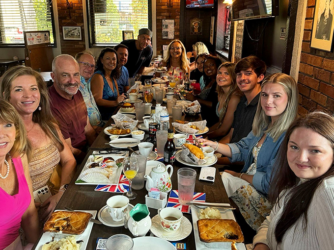Happy diners gathered 'round the table, proving that good food is the universal language. Tea and sympathy not included.