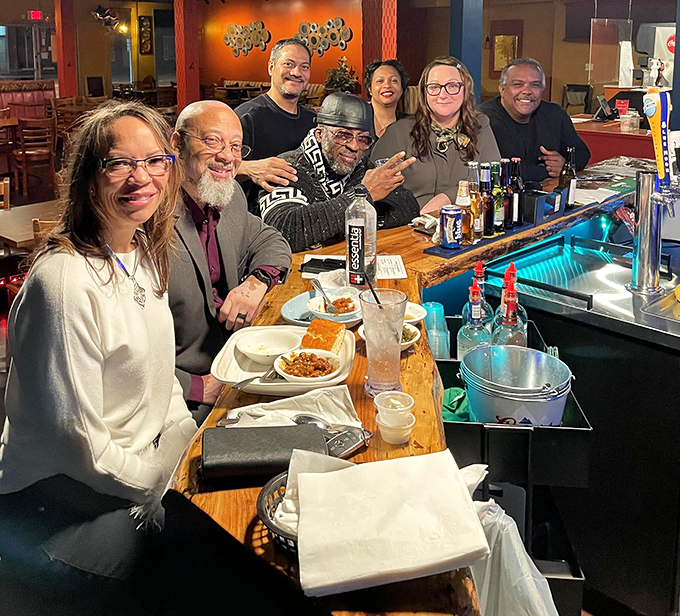 The bar area isn't just serving drinks&mdash;it's serving community. Where strangers become friends over shared food obsessions.