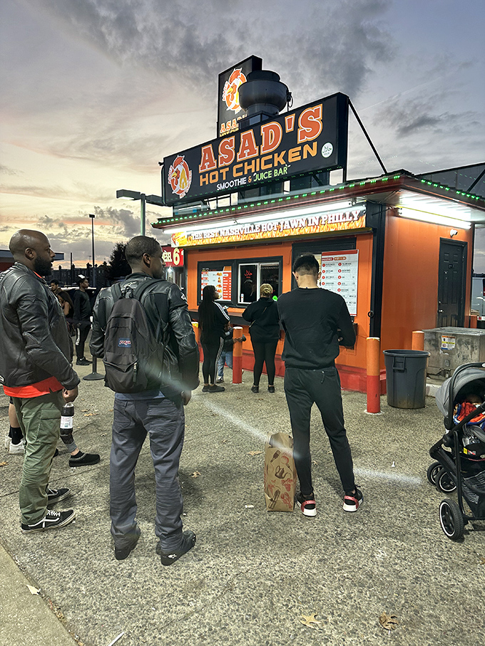 The nighttime line forms like a pilgrimage to the temple of spice. These people know something you don't&mdash;yet.