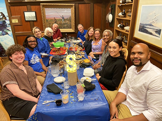 Generations gathering around a blue-clothed table, proving that The Wellwood isn't just serving meals&mdash;it's hosting memories in the making.