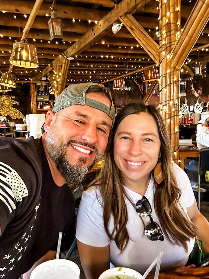 Happy diners creating memories that will last longer than the seafood aroma on their fingers. This is what vacation tastes like.