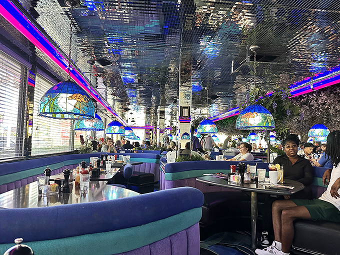 Booths designed for both privacy and people-watching&mdash;the perfect Vegas combination. Those Tiffany-style lamps cast the kind of flattering light everyone deserves.