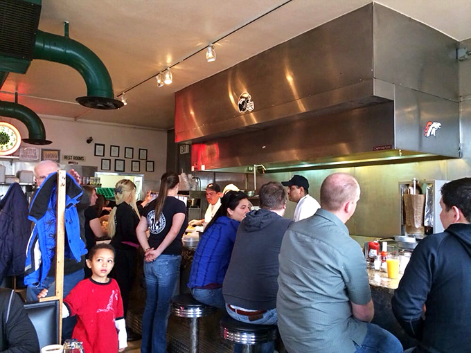 Morning rush at Pete's—where strangers become neighbors over the universal language of "pass the hot sauce, please."