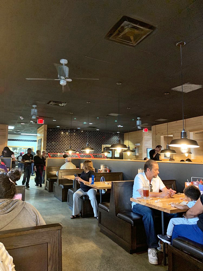 Where strangers become neighbors over shared tables and the universal language of "mmm" replaces actual conversation.