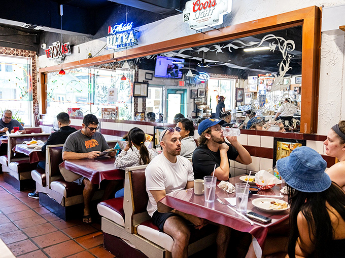 The dining room hums with the universal language of satisfied eaters. Notice how nobody's looking at their phones&mdash;the food demands full attention.