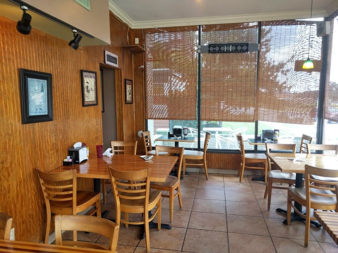 Morning light streams through bamboo blinds, creating the perfect setting for contemplating life's big questions &ndash; like which sandwich to order next.