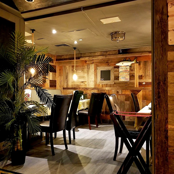 Wooden walls and comfortable seating create intimate dining nooks where serious seafood business can be conducted in peace.