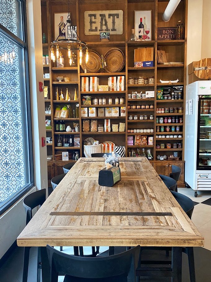 This isn't just a table&mdash;it's a community gathering spot where strangers bond over the universal language of "mmm" and "you have to try this."